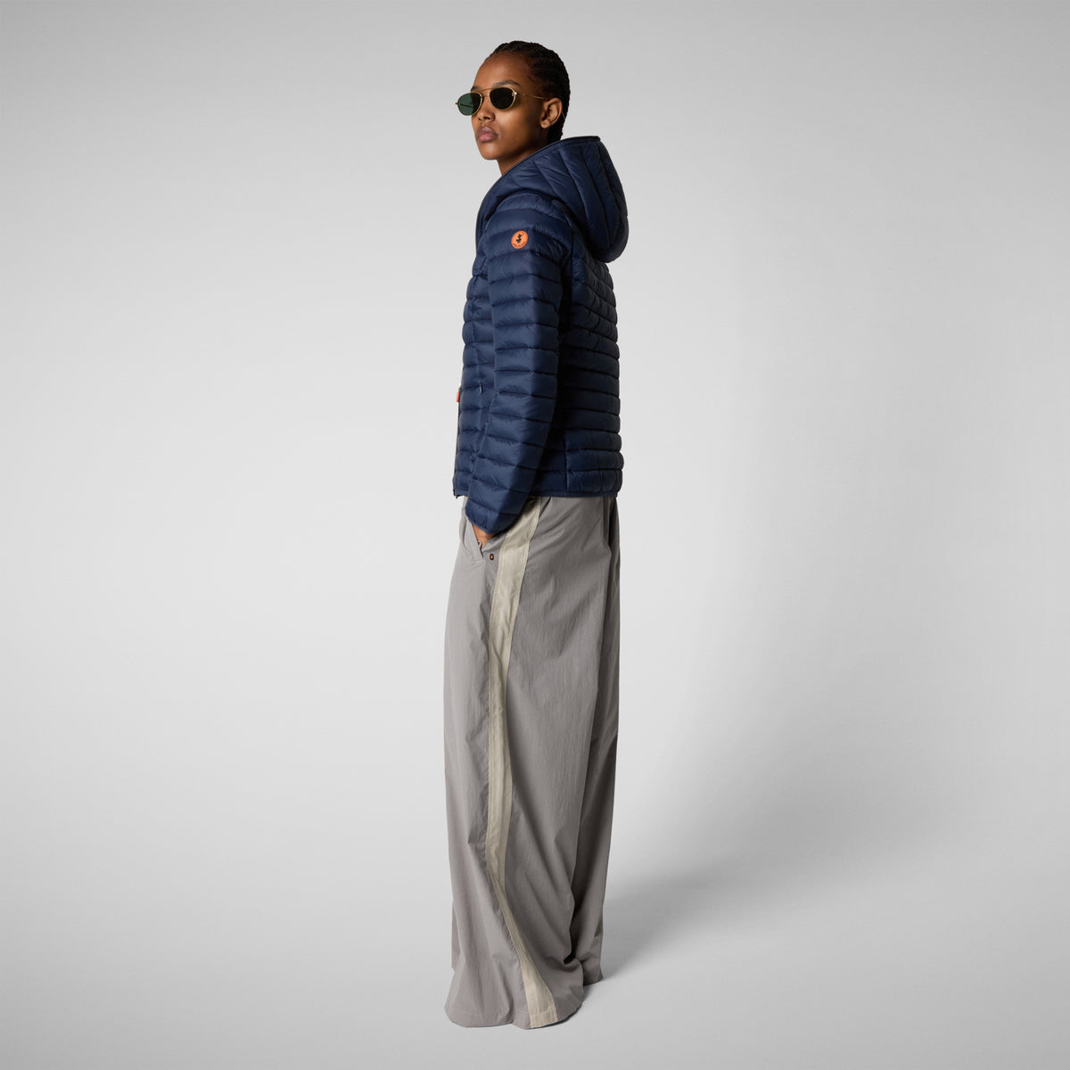 Woman's animal free hooded puffer jacket Daisy in navy blue
